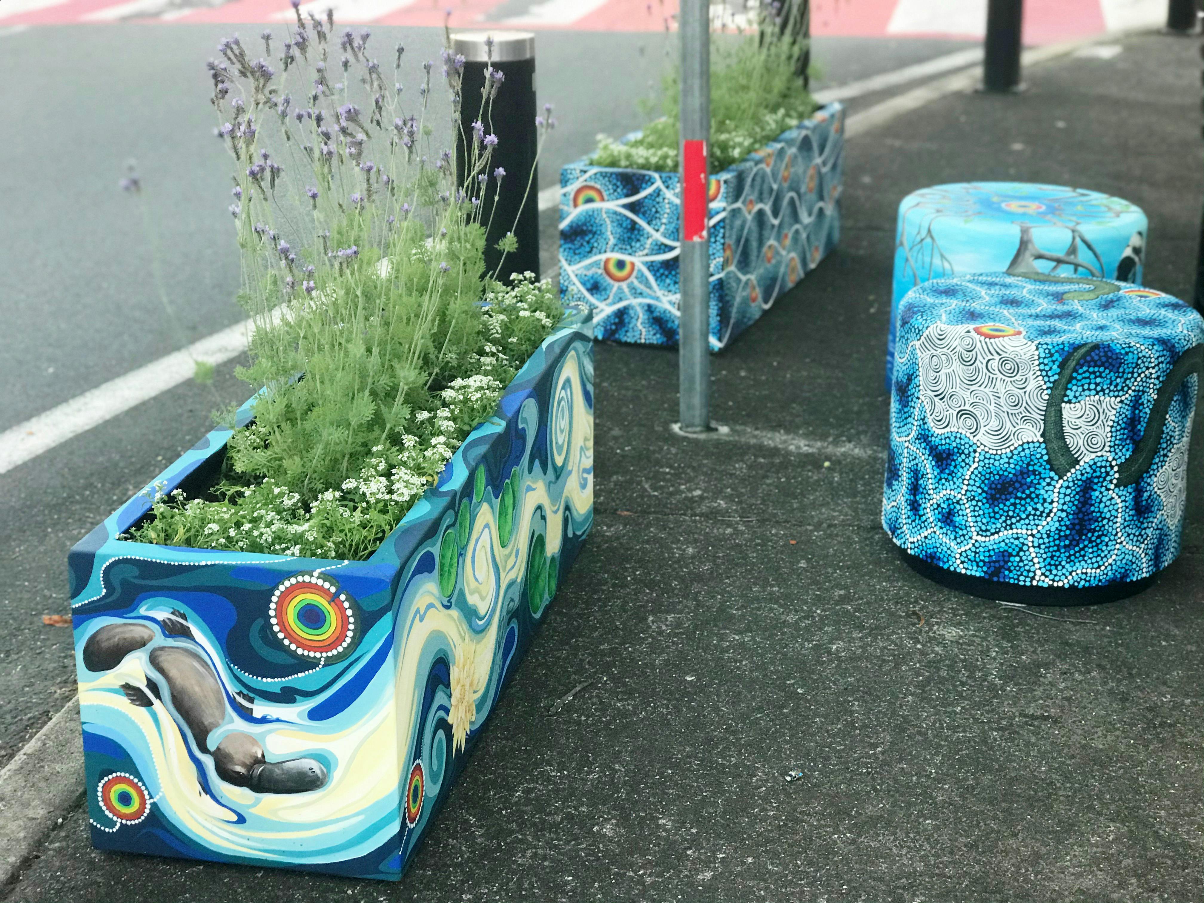 Art seats and planter boxes on display | Behind the scenes: parklets ...