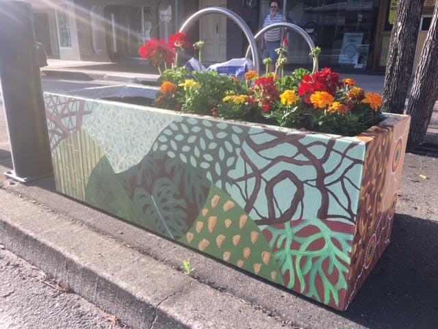 Art seats and planter boxes on display | Behind the scenes: parklets ...